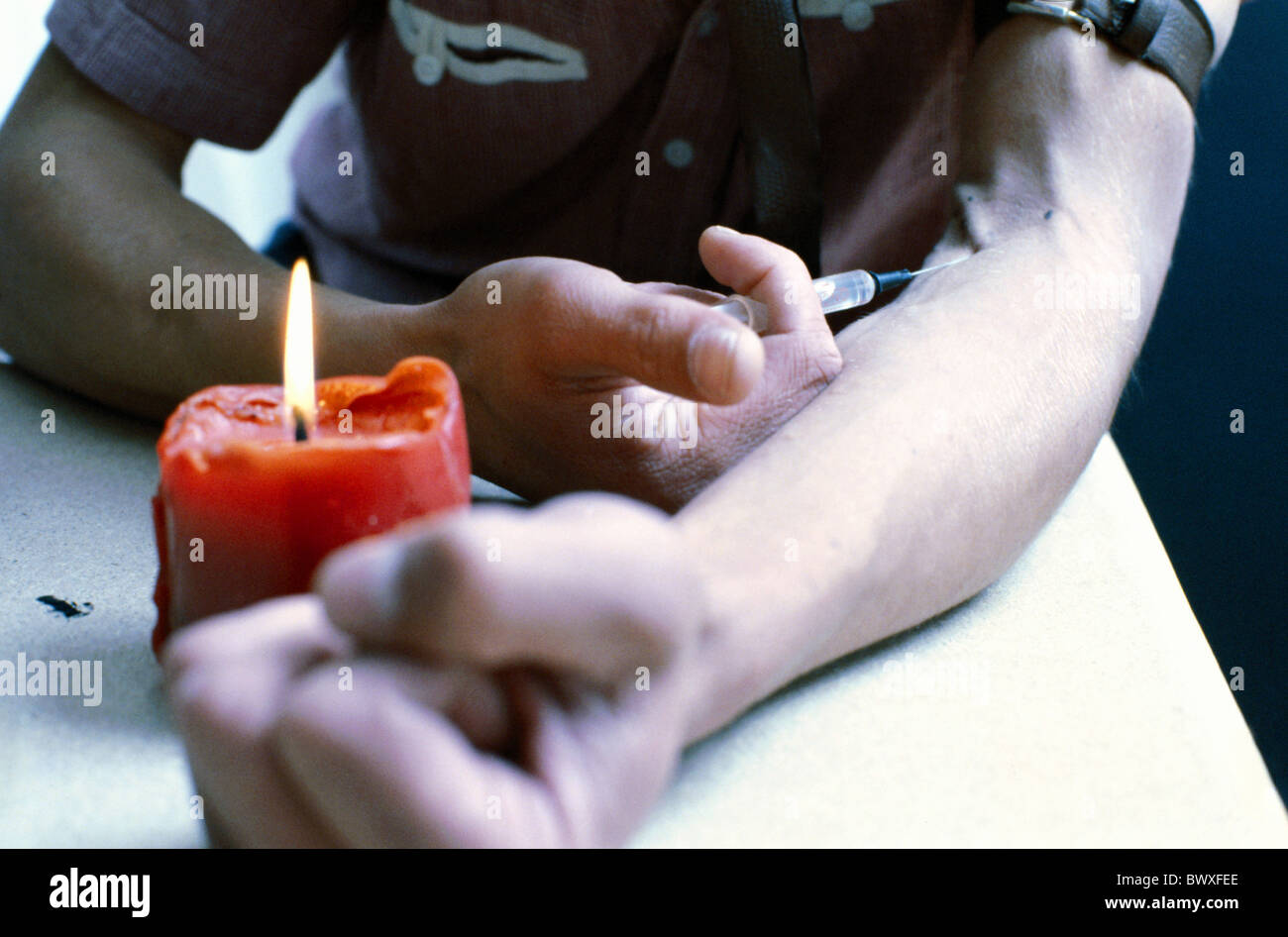 arm drug dependent drugs candle shot putting placing betting syringe ...