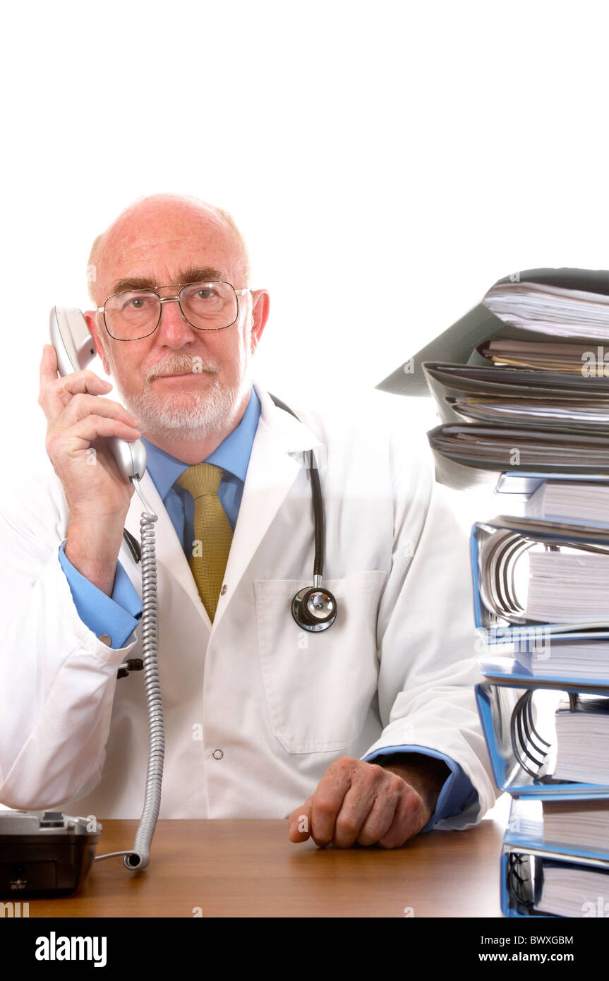 Doctor using telephone Stock Photo - Alamy