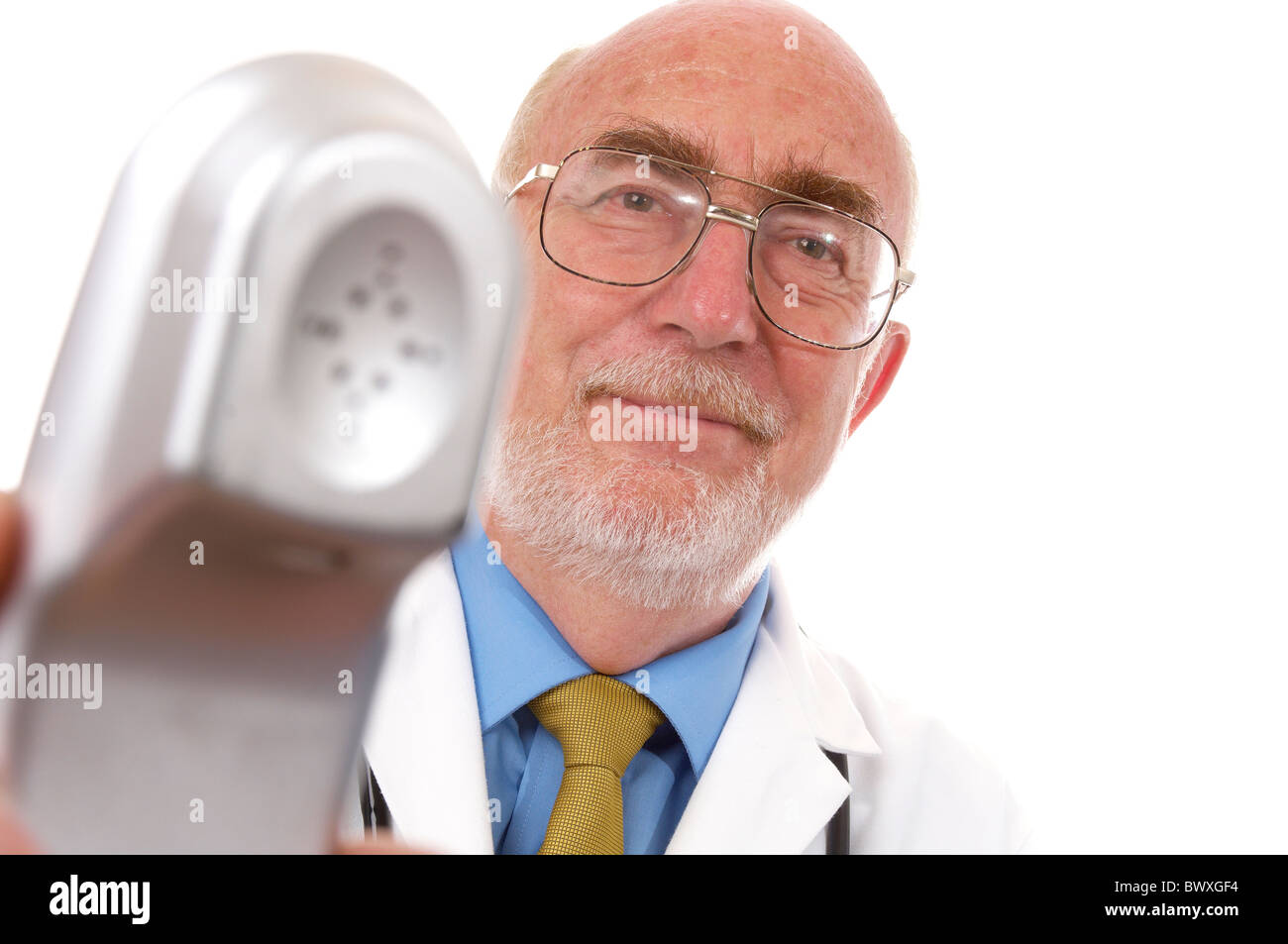 Doctor holding out a telephone Stock Photo - Alamy