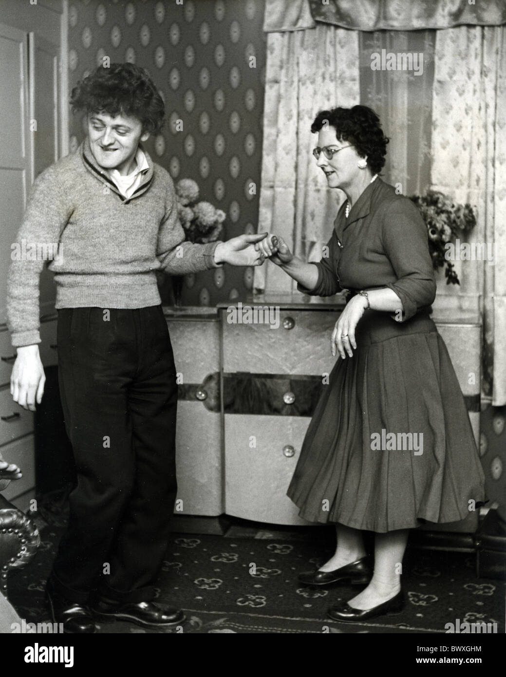 WEE WILLIE HARRIS English rock singer with his ,mother at their ...