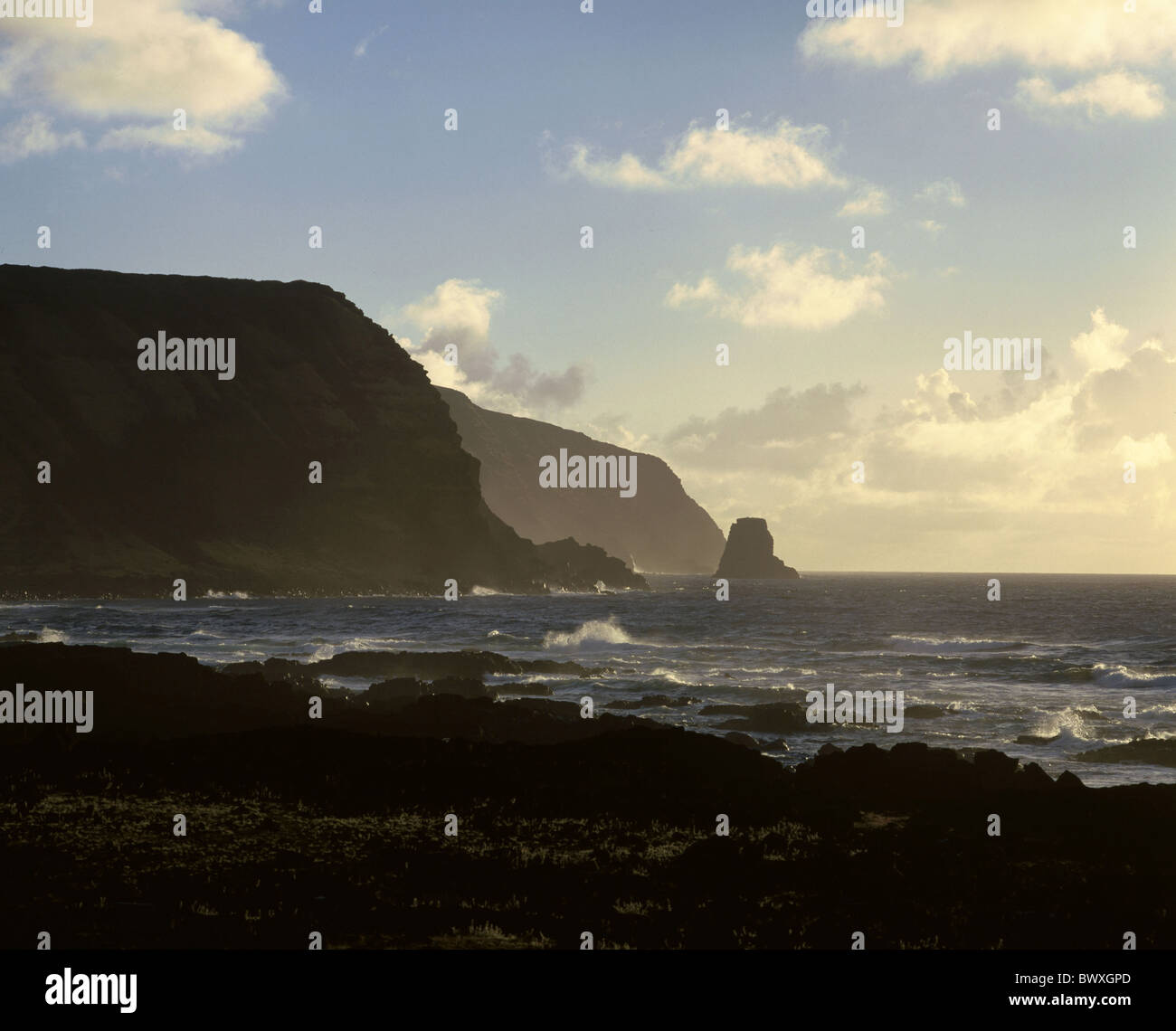 surf waves dusk twilight coast Easter islands Pacific Rapa ...