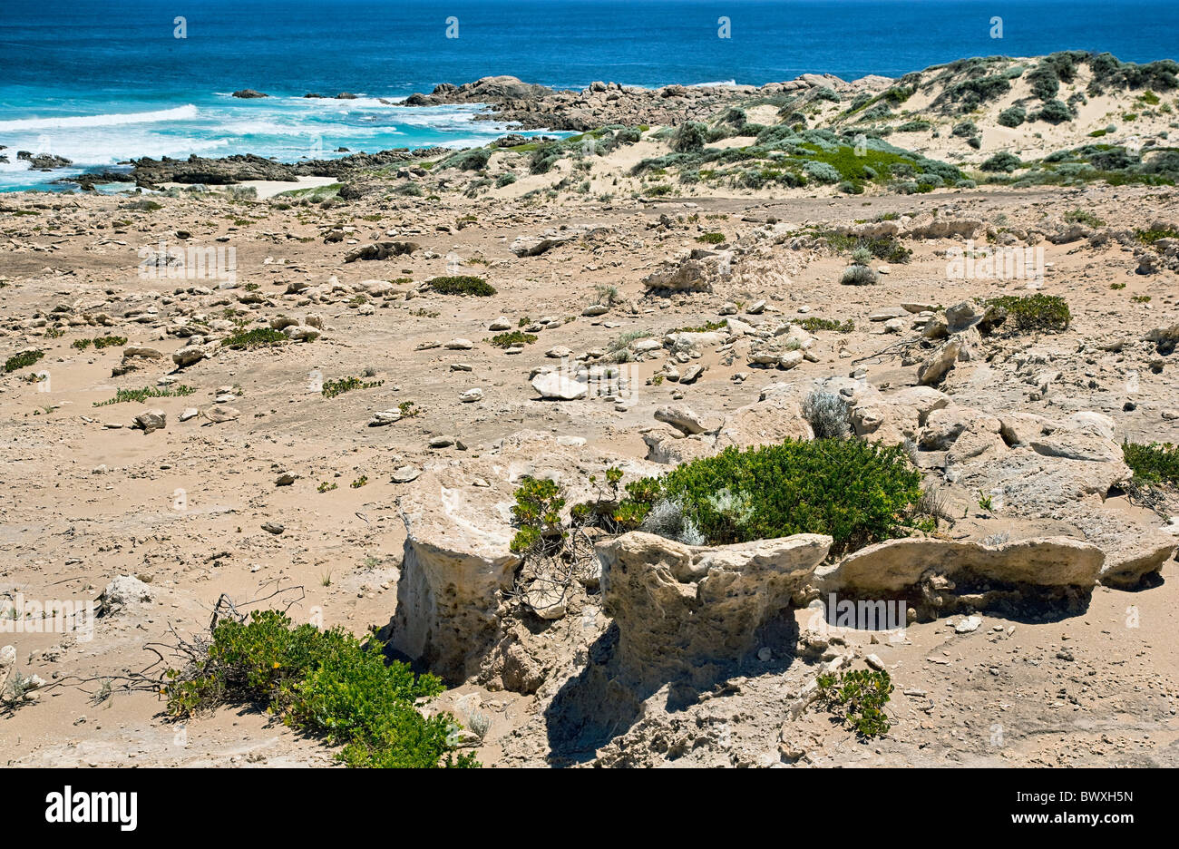 The other side of the moon is a barren rocky area beside the headland ...