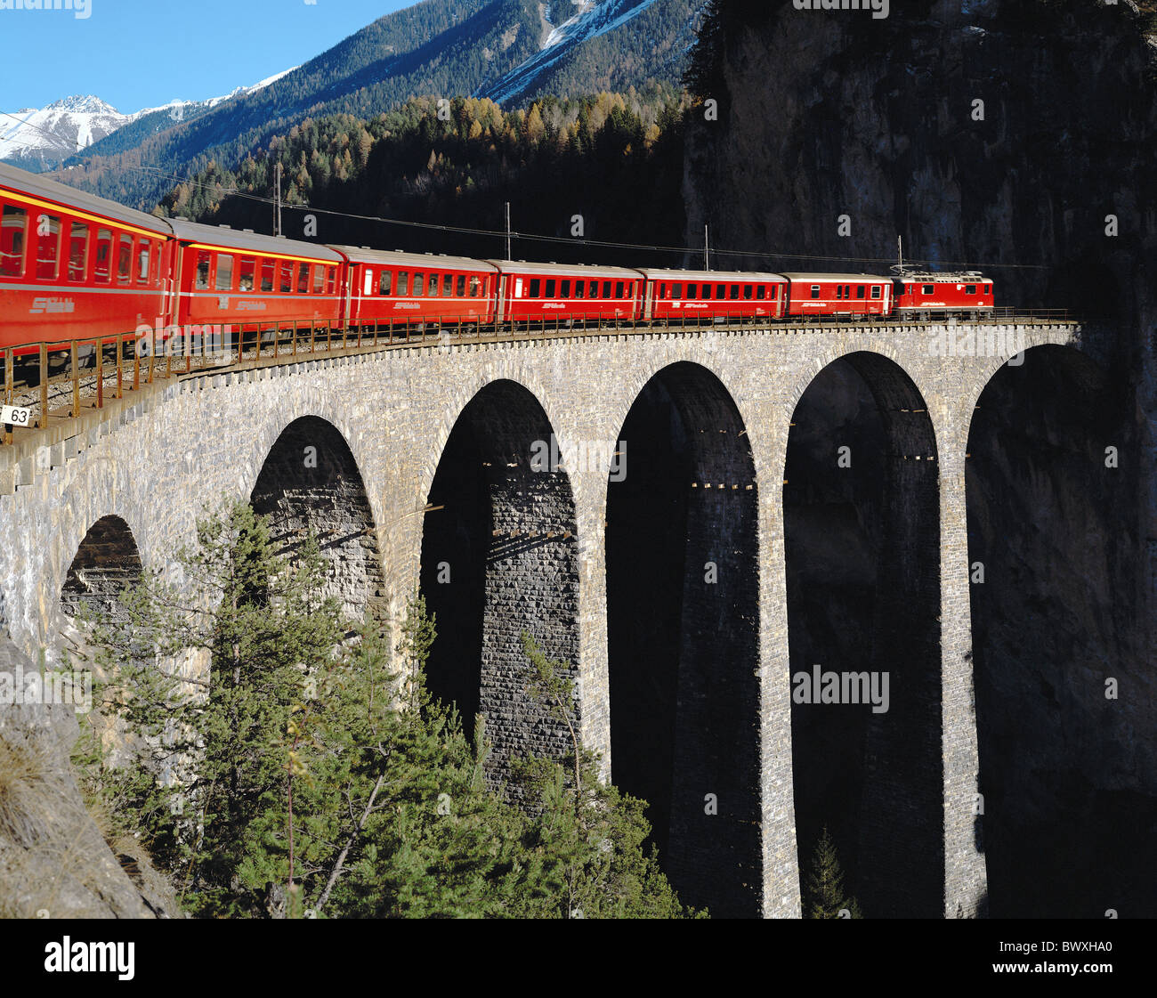 railway mountains Glacier express train Graubunden Grisons land water ...