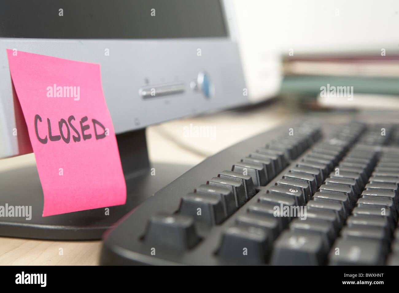 Closed sticky note on a computer monitor Stock Photo - Alamy