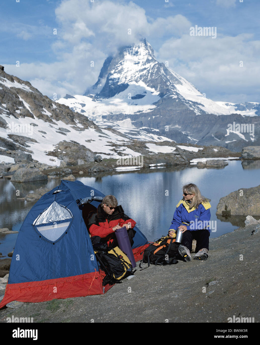 mountain lake camping tents tent camping alpine Alps mountains trekking ...