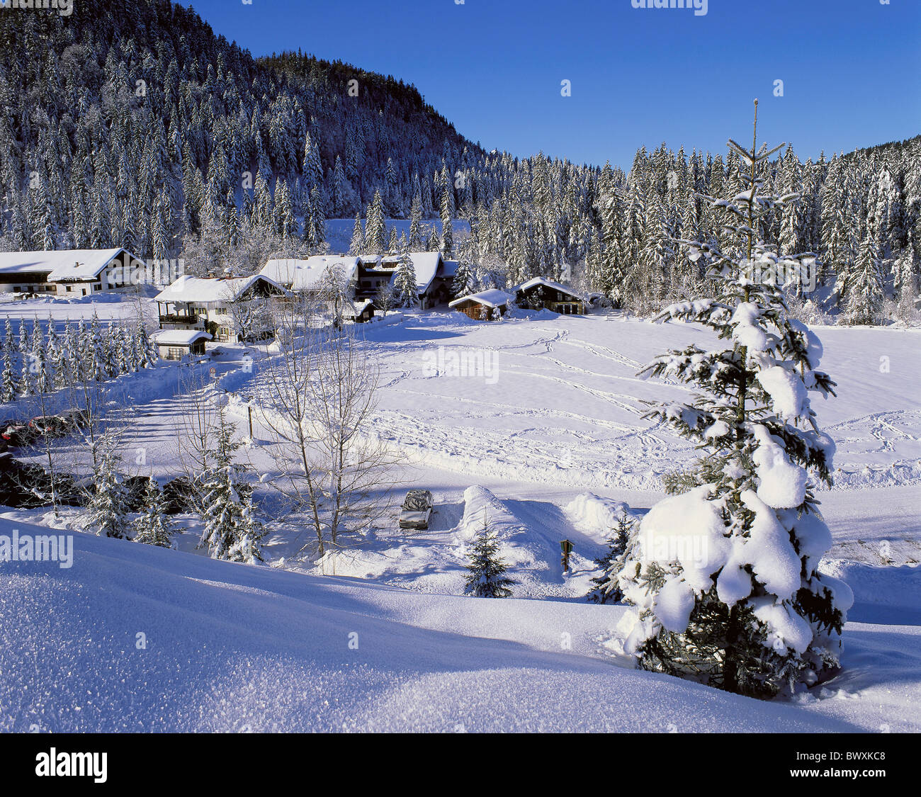 Germany Europe Bavaria Elmau in weather stone houses homes snow wood ...
