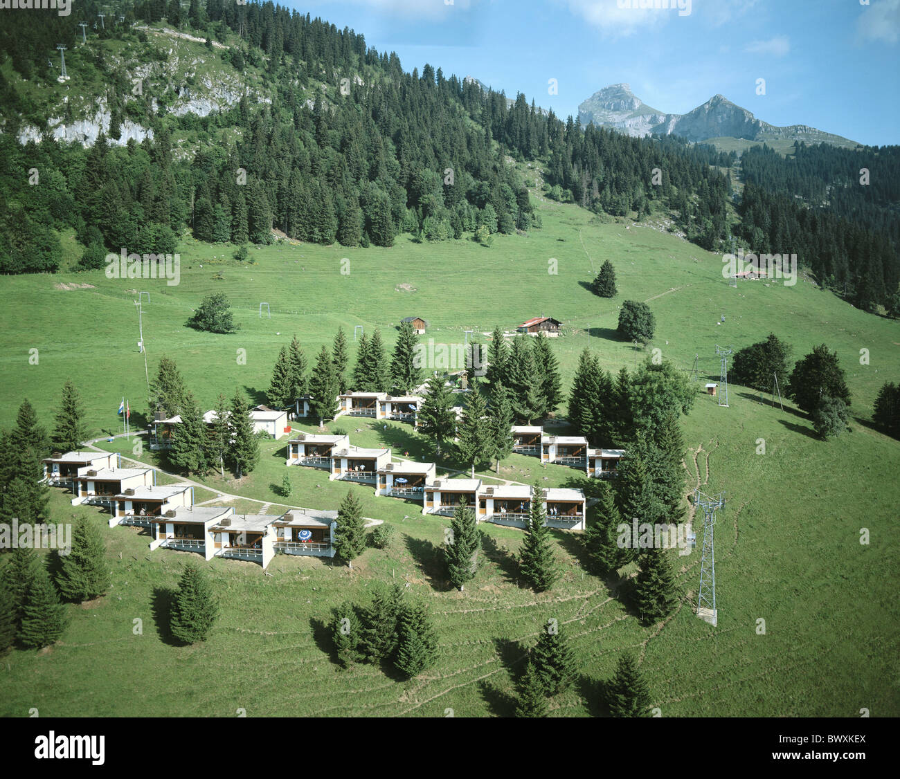 alpine Alps holiday resort mountains bungalows slope inclination Leysin ...