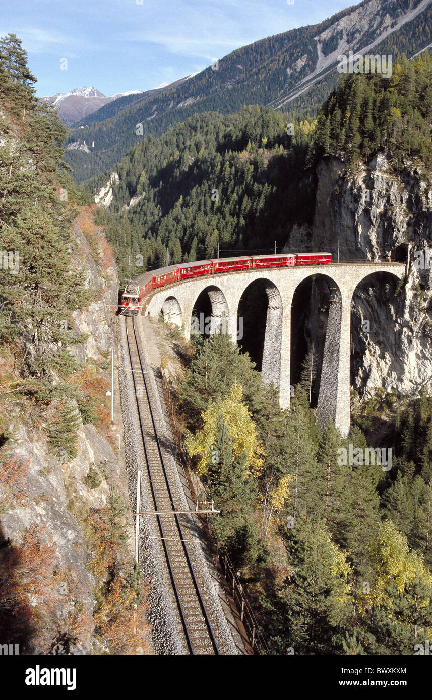railway Glacier express train land water viaduct mountains alpine Alps ...
