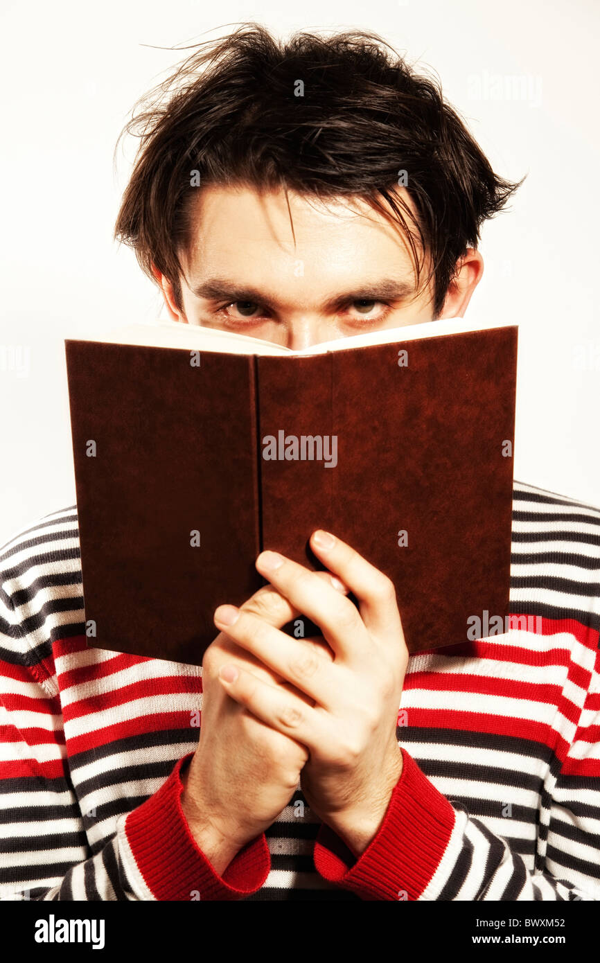 young man reading book on white background Stock Photo - Alamy