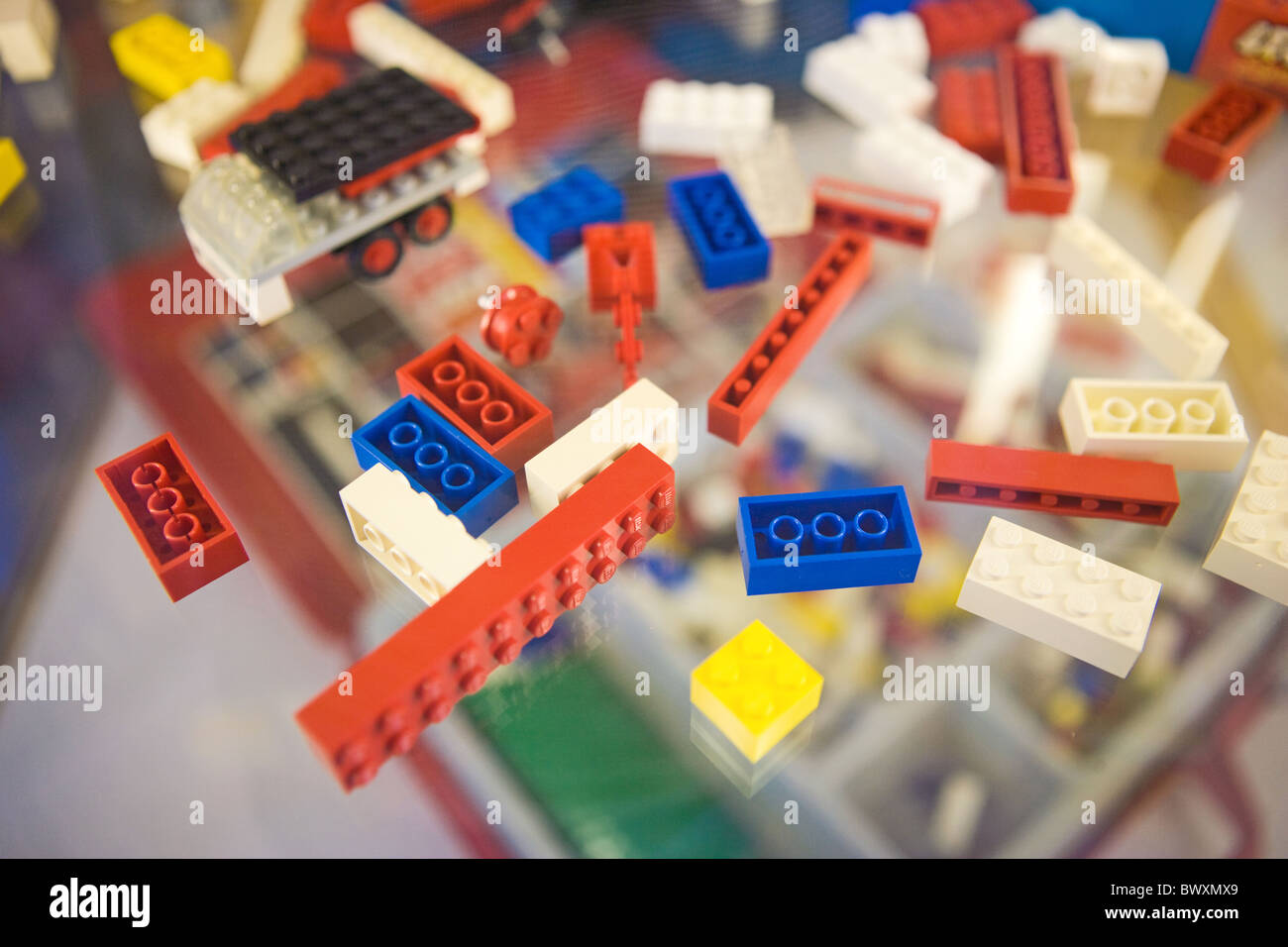 Lego bricks on a glass shelf Stock Photo - Alamy