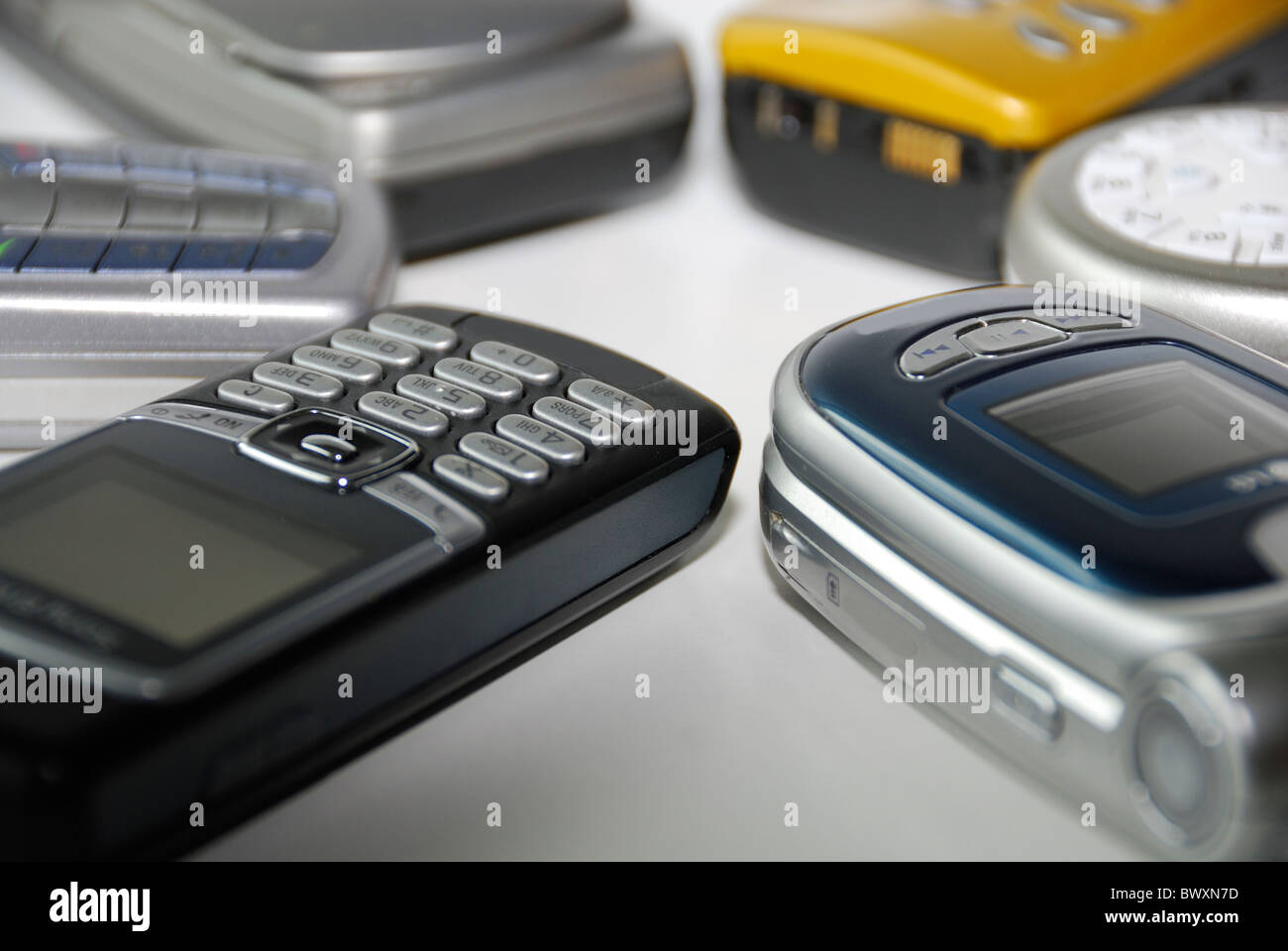 A variety of several mobile cell phones with a shallow depth of field ...