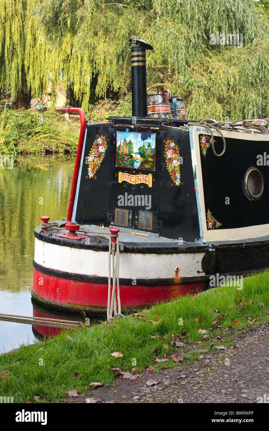 Colourful narrowboat moored on section of Grand Union Canal Stock Photo ...