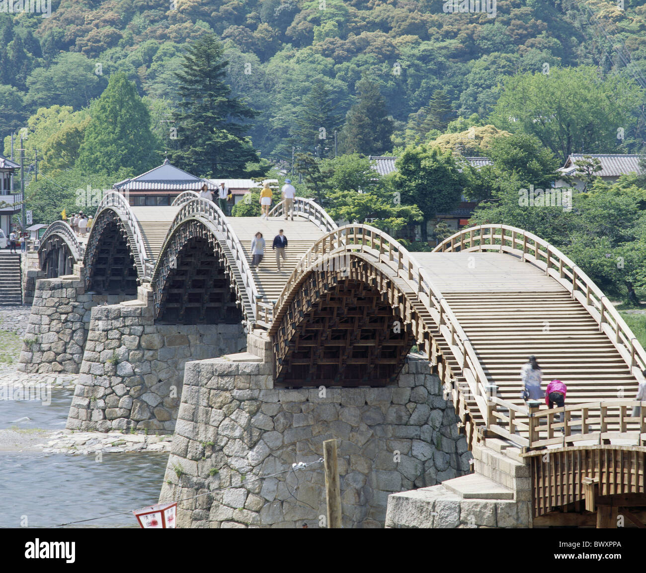 curved bridge houses homes Japan Asia Kintaibashi people Stock Photo ...
