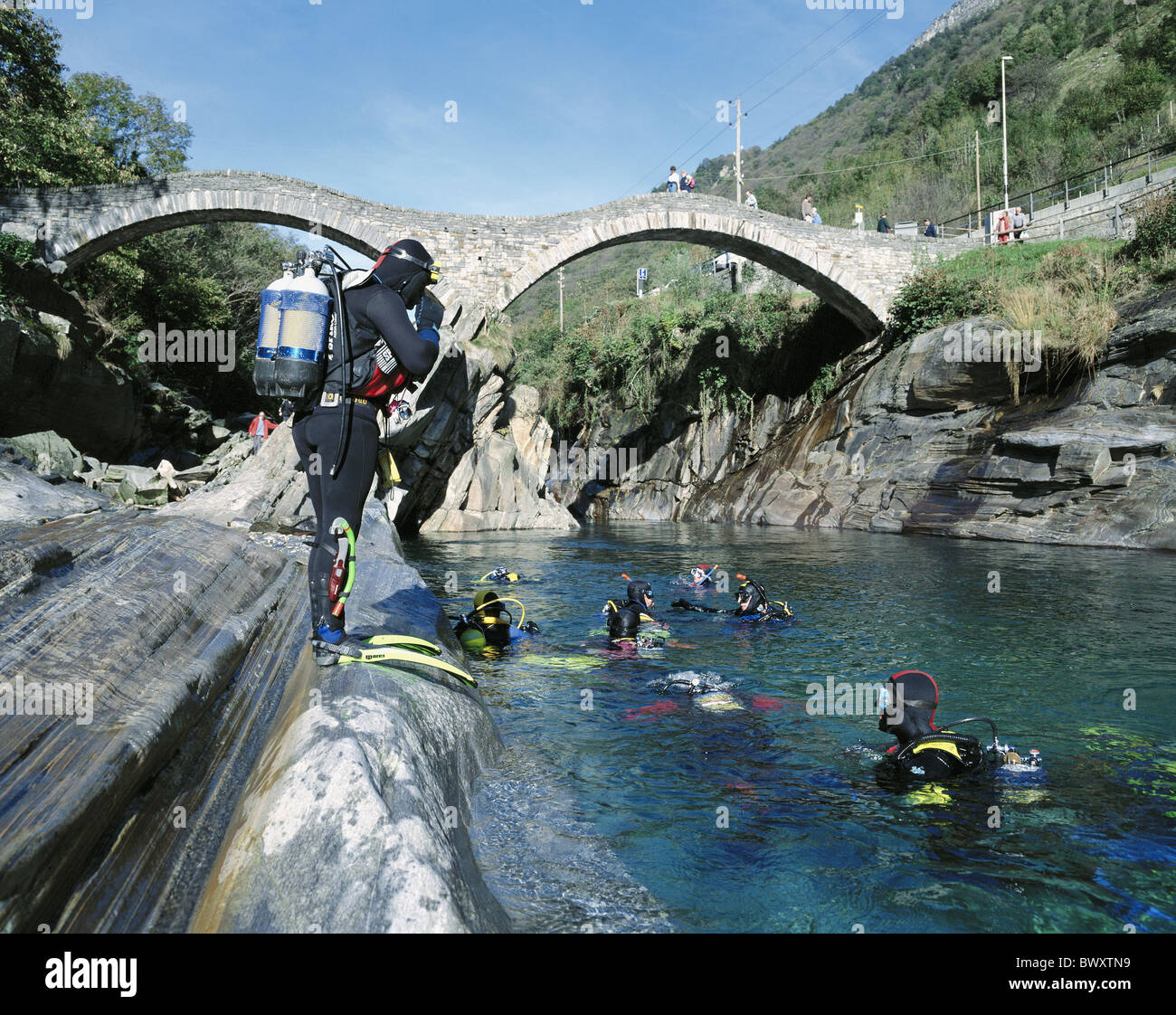 river diving diver near Lavertezzo river flow canton Ticino Switzerland ...