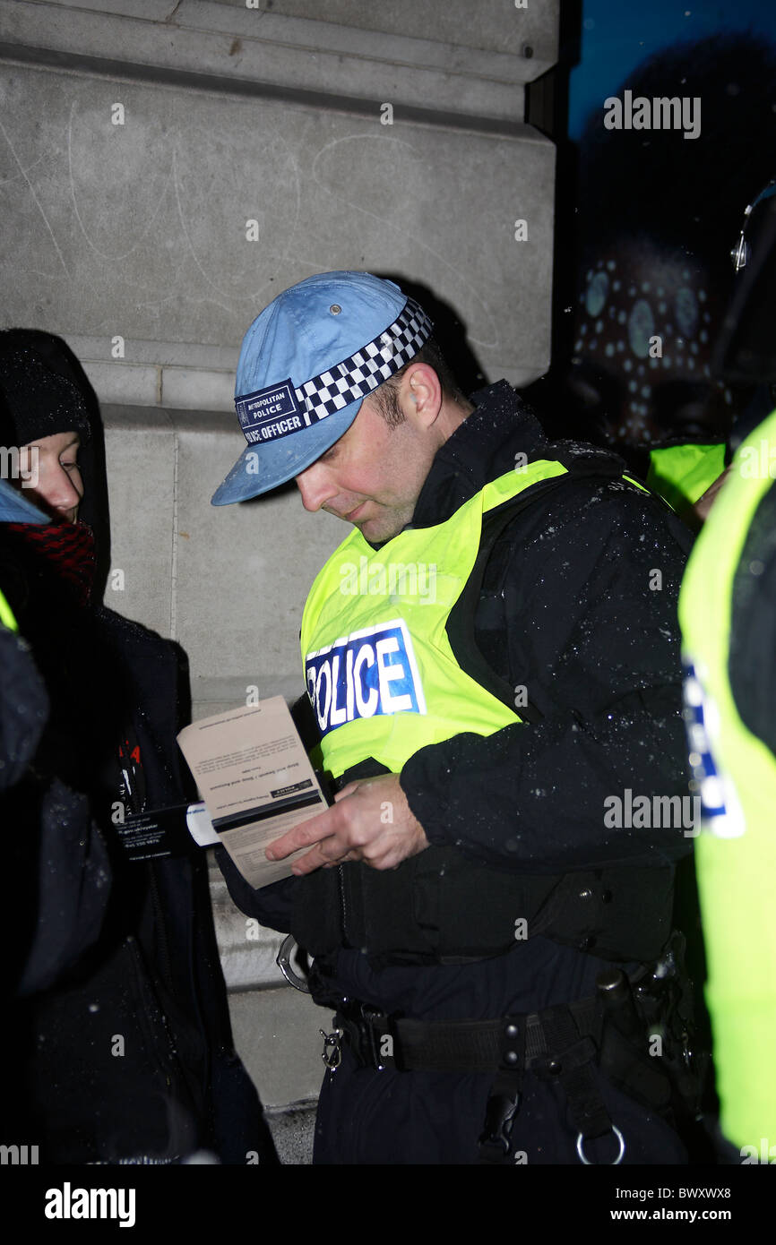 TSG officer completing stop and search form Stock Photo - Alamy