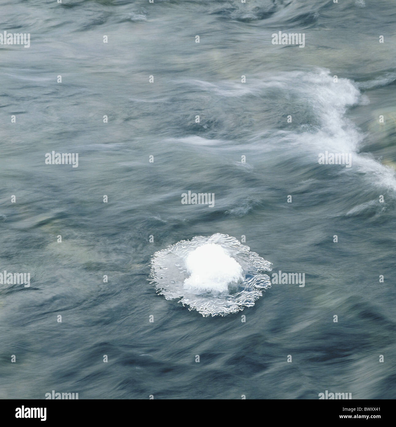 river flow ice winter water snow flow Stock Photo - Alamy