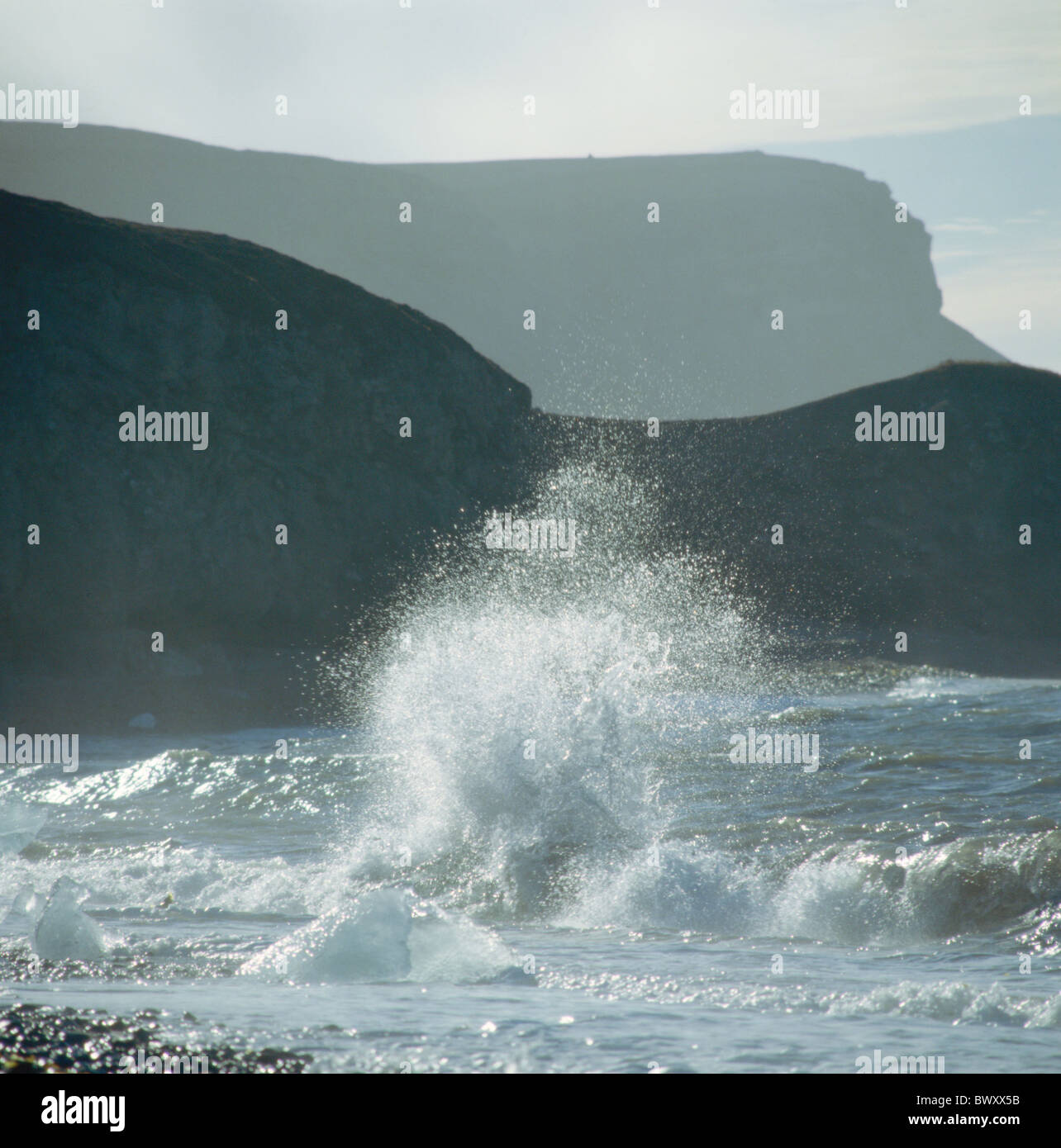 surf waves rocks cliffs coast wave Spitsbergen Scandinavia Stock Photo ...