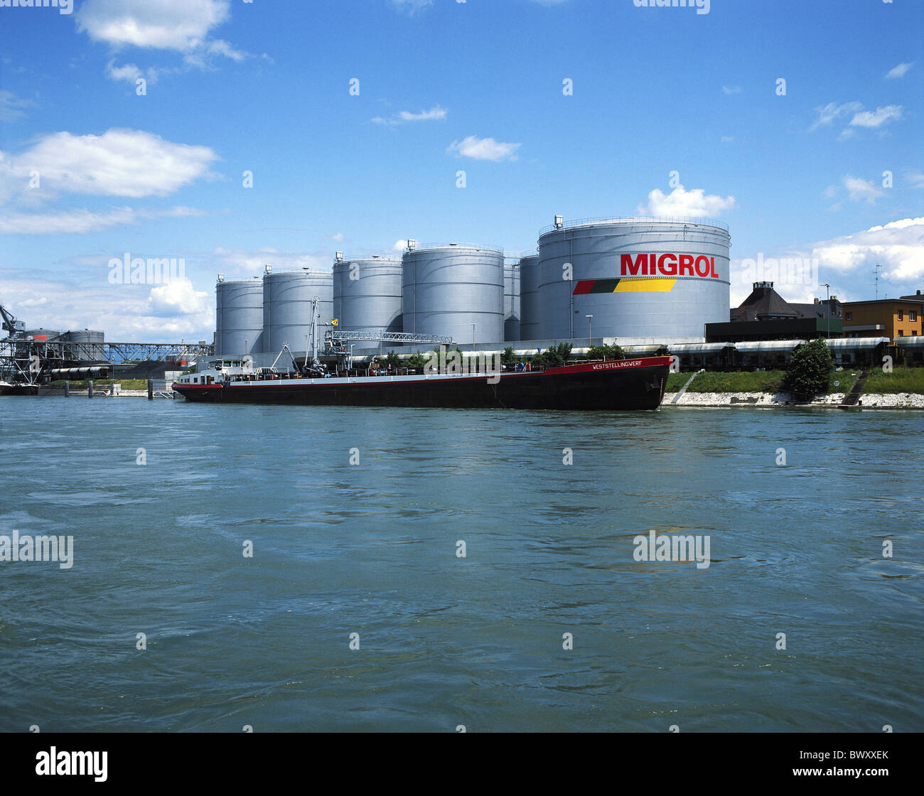 Switzerland Europe industry harbour port Binnenhafen river flow town ...