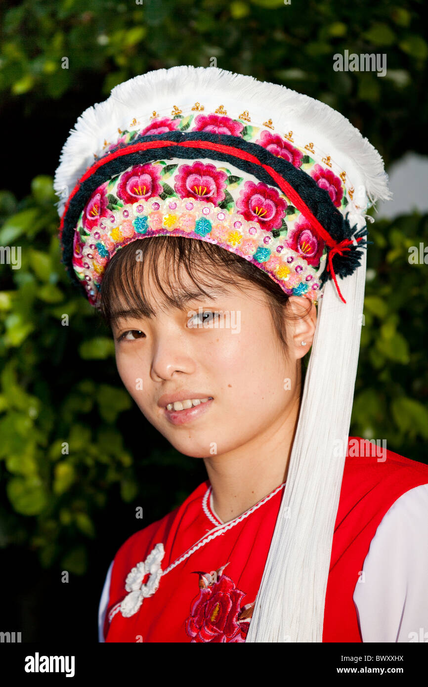 Bai woman wearing a colourful traditional Bai costume, Dali, Yunnan ...