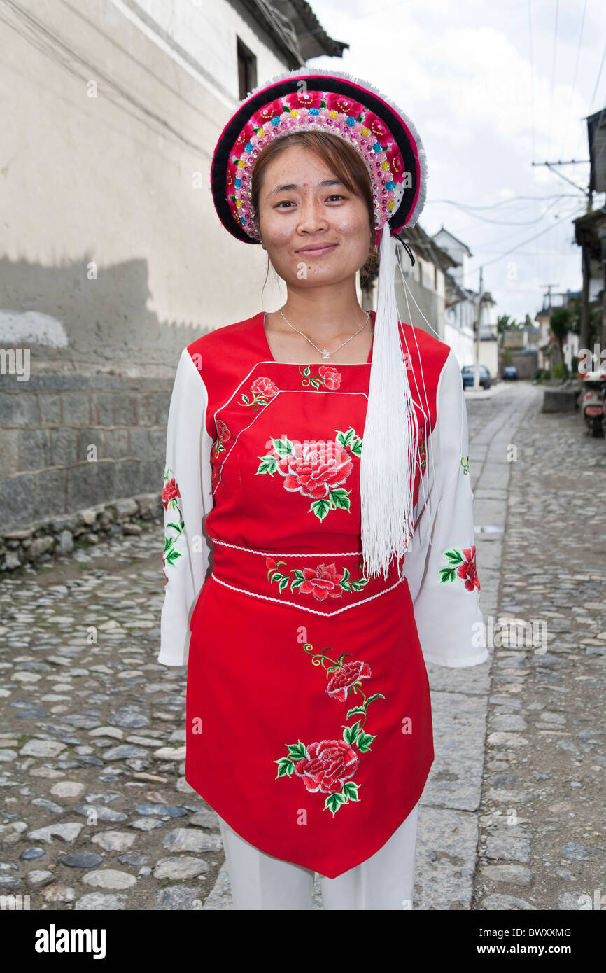 Bai woman wearing a colourful traditional Bai costume, Dali, Yunnan ...