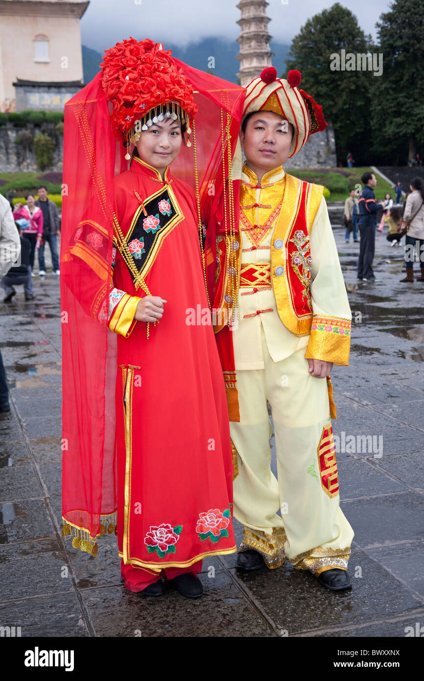 Man and woman wearing traditional colourful costumes, Dali, Yunnan ...