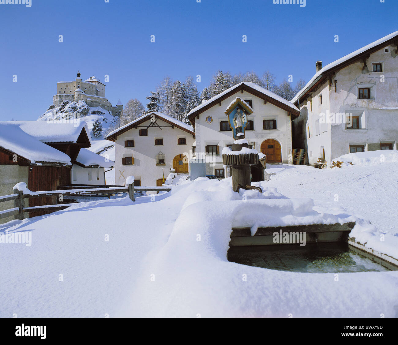 Switzerland Europe Graubunden Grisons Tarasp village square castle well ...