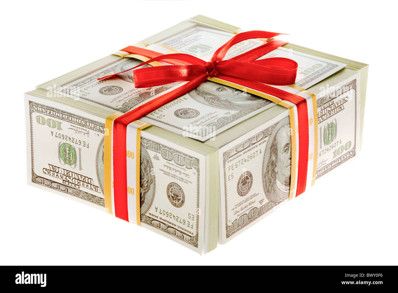 Photo of 3d box made up of dollars decorated with red ribbon over white ...