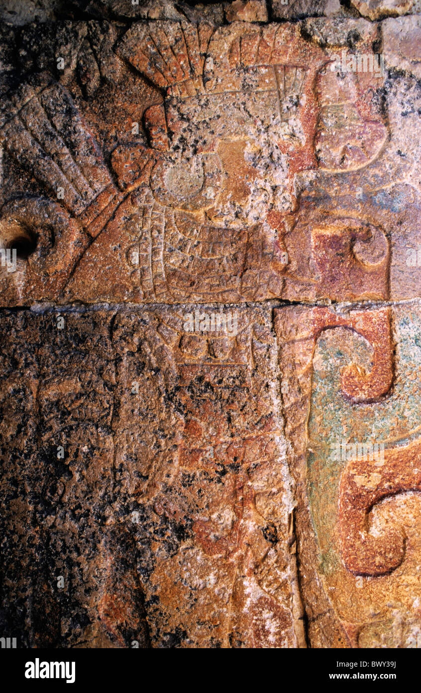 Toltec warrior carved on a stone wall at the ancient site of Chichen ...
