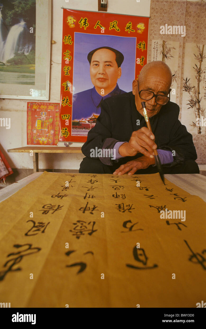 Elderly Chinese writing brush maker writing calligraphy, Beijing, China ...