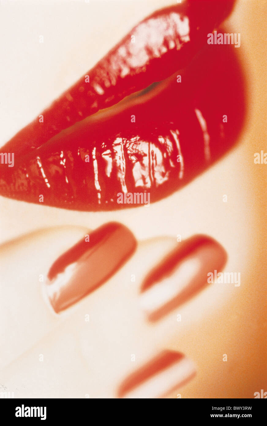 Beauty greasepaint make-up woman detail lips red fingernails varnishes ...