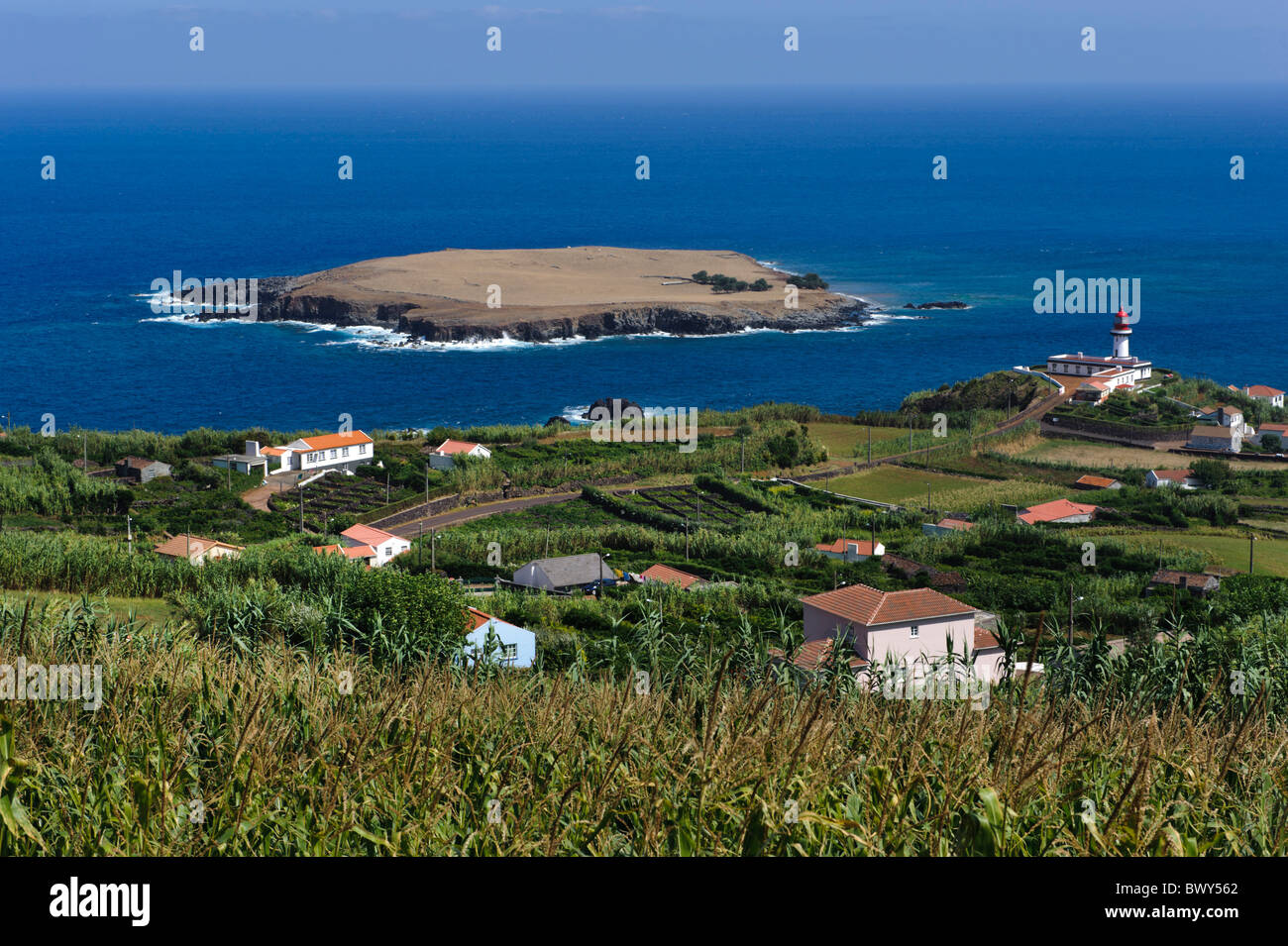 Ilheu do Topo and Lighthouse, Isle of Sao Jorge, Azores Stock Photo - Alamy