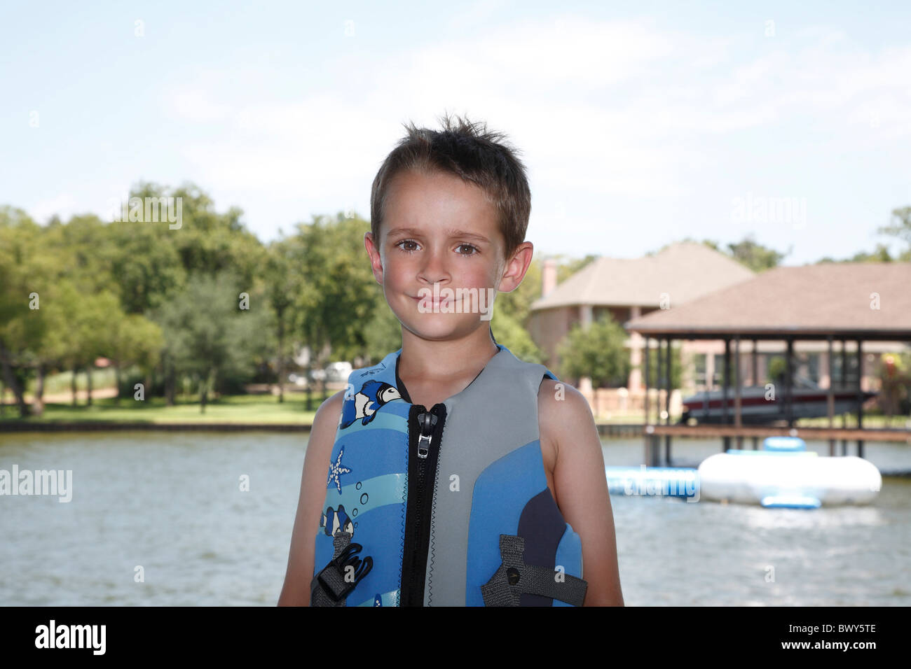 Portrait of Boy Wearing Life Jacket Stock Photo - Alamy