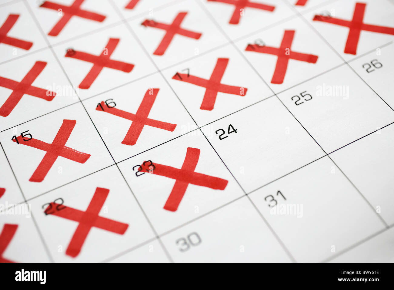 Calendar with X's up to the 24th Stock Photo - Alamy