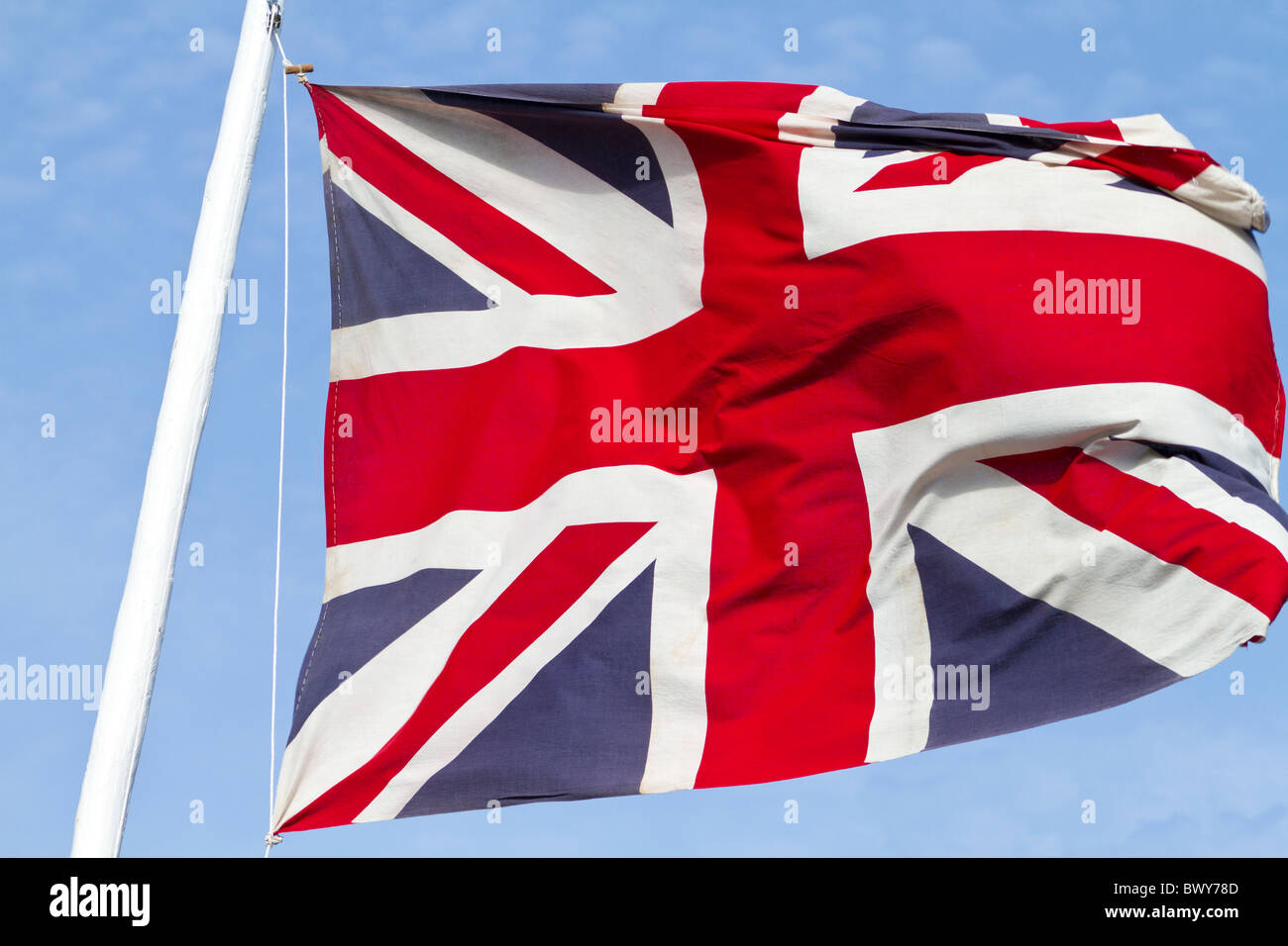 Union flag flying with blue sky at the 2010 Goodwood Revival meeting ...