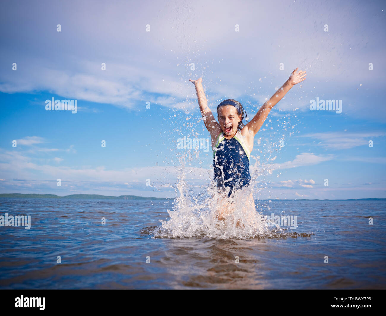 10 11 years girl jump lake hi-res stock photography and images - Alamy
