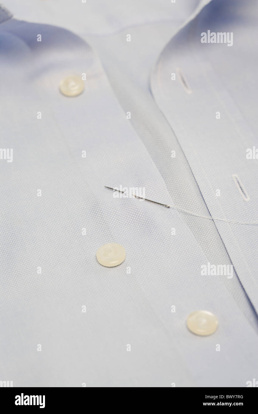 Dress Shirt with Missing Button Stock Photo - Alamy