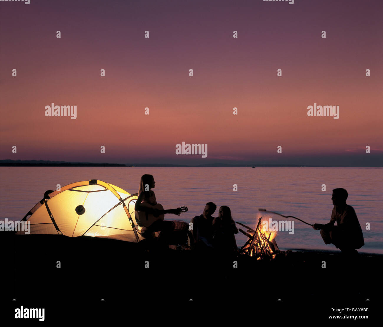 at night campfire camping couples entertainment fire fireplace group ...
