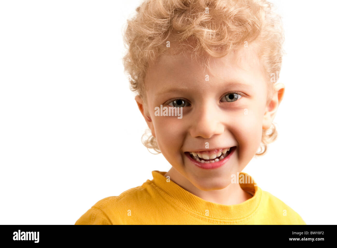 Portrait of happy lad laughing over white background Stock Photo - Alamy