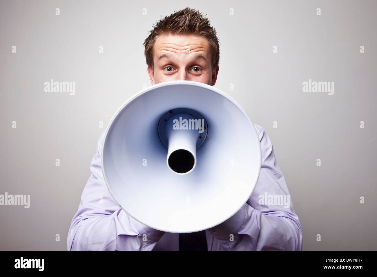 Businessman With Megaphone Stock Photo - Alamy