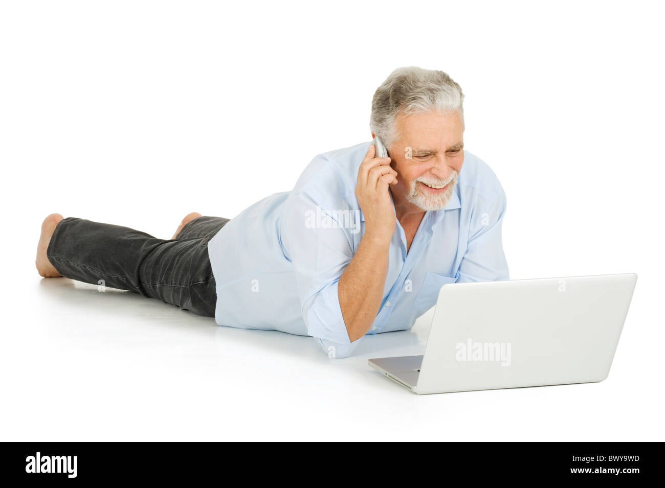 elderly man using laptop Stock Photo - Alamy