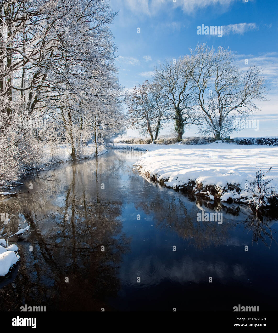 Winter sun glistens off the snow at Pickering Beck Stock Photo - Alamy