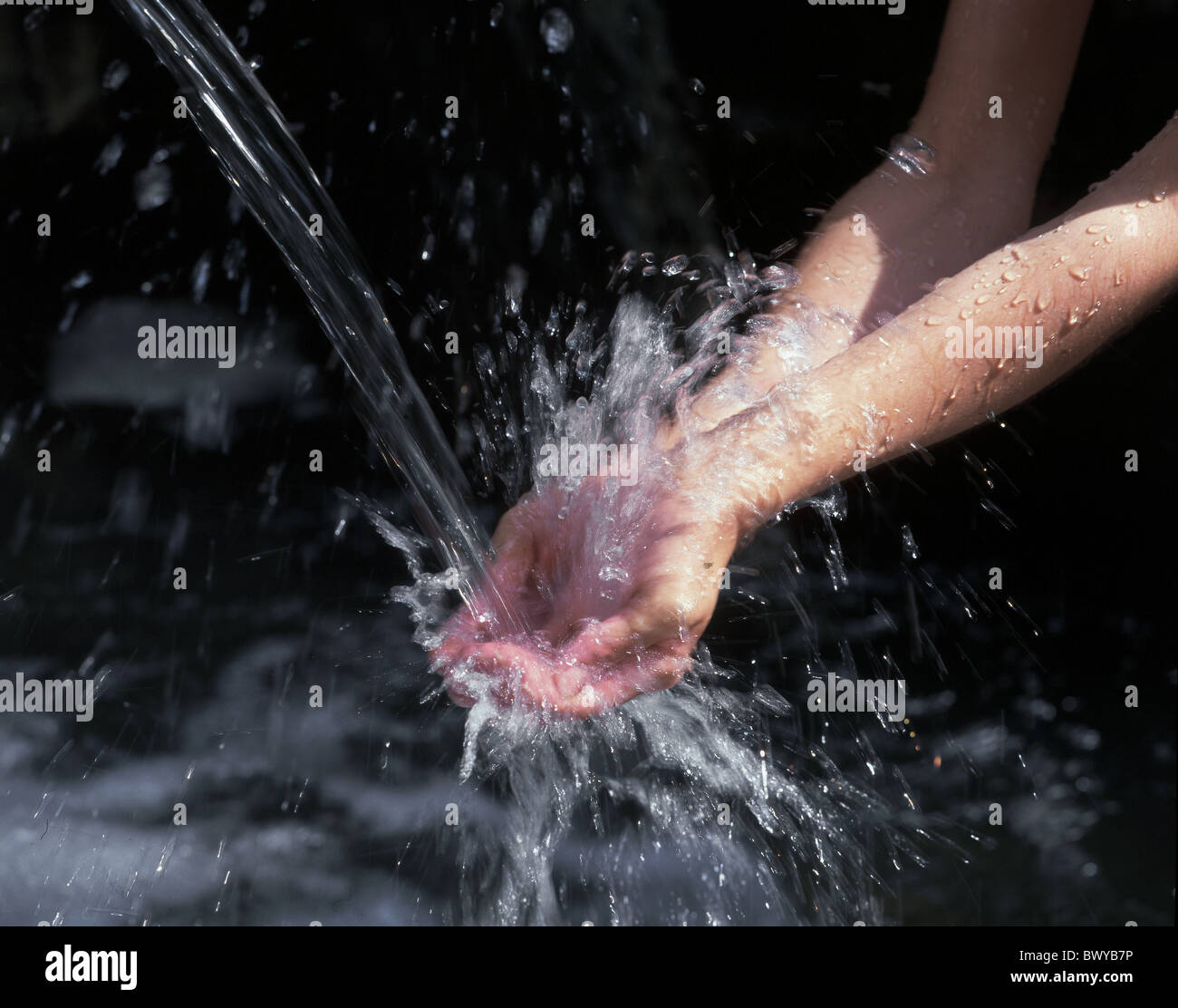 bath bathing chilling hands jet of water person refreshment splash ...