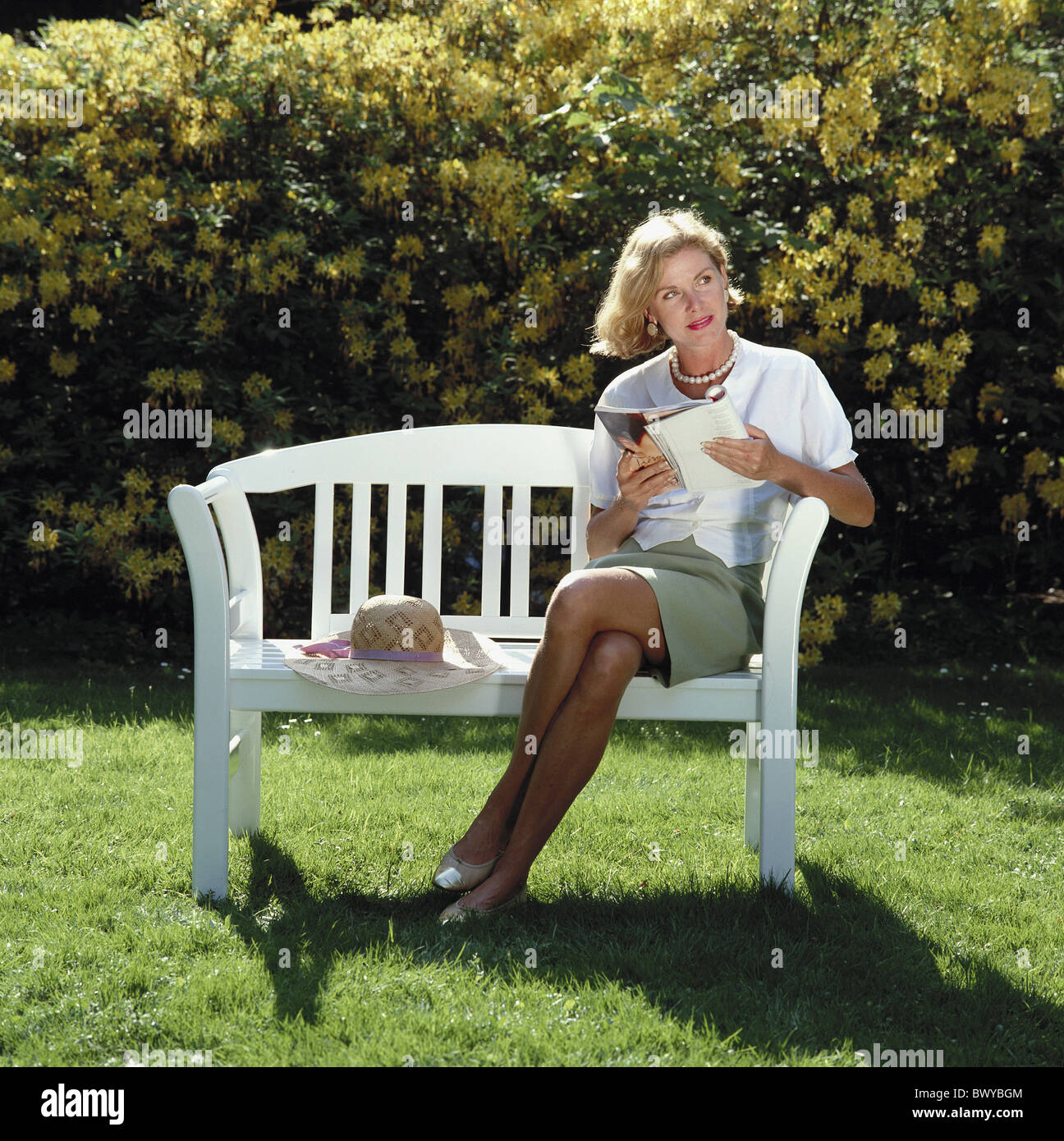 outside woman spring reading park read person park-bench Stock Photo ...