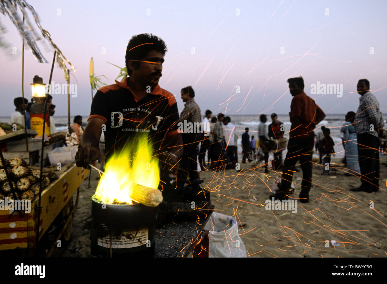 Corn roasting- Marina beach, Chennai Stock Photo - Alamy
