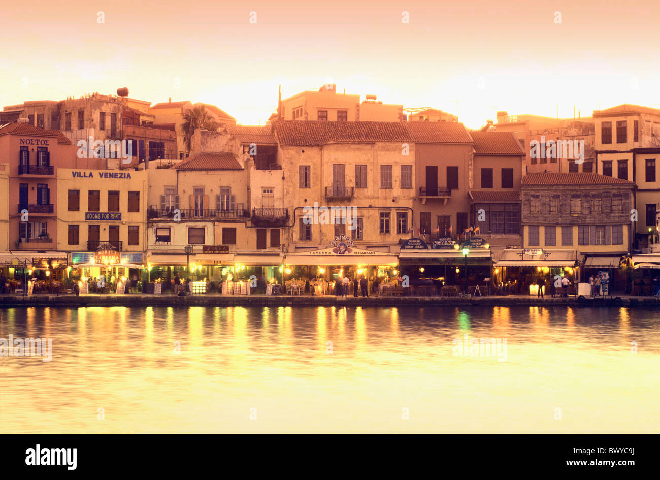 Chania dusk twilight facades Greece Crete sea promenade mood Venetian ...