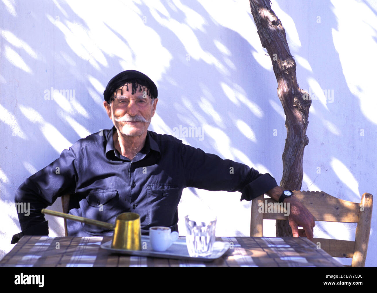 outside drinks Greece headgear Crete man model released portrait Sariki ...