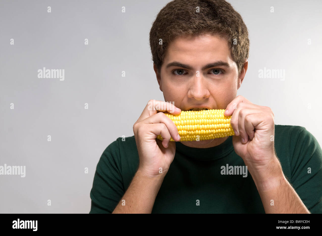 Adult eating maize hi-res stock photography and images - Alamy