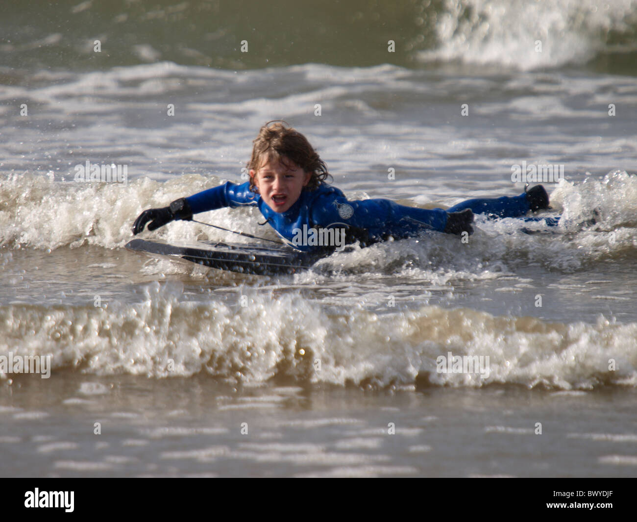 Boy bodyboarding hi-res stock photography and images - Alamy