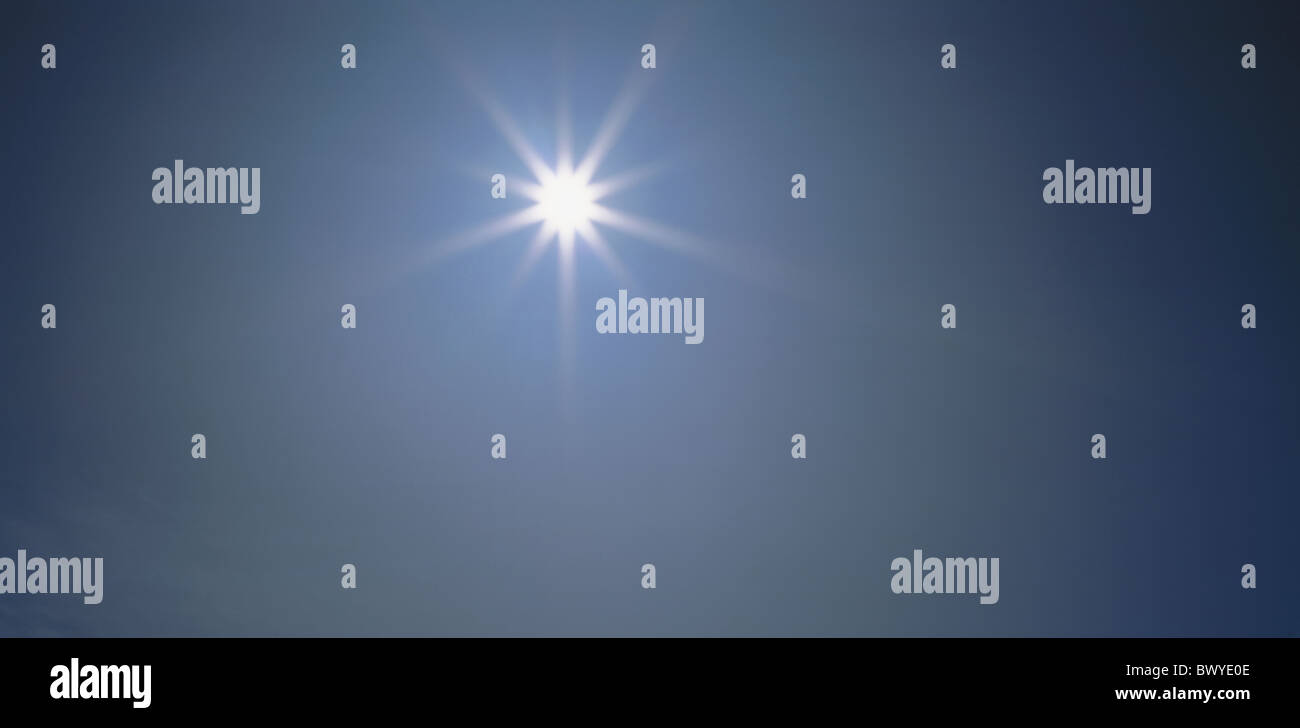 light reflections sun star-shaped shine sky blue Stock Photo - Alamy