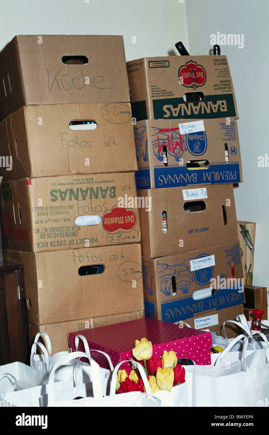 on each other stacked up piled up banana boxes paper bags boxes piles ...